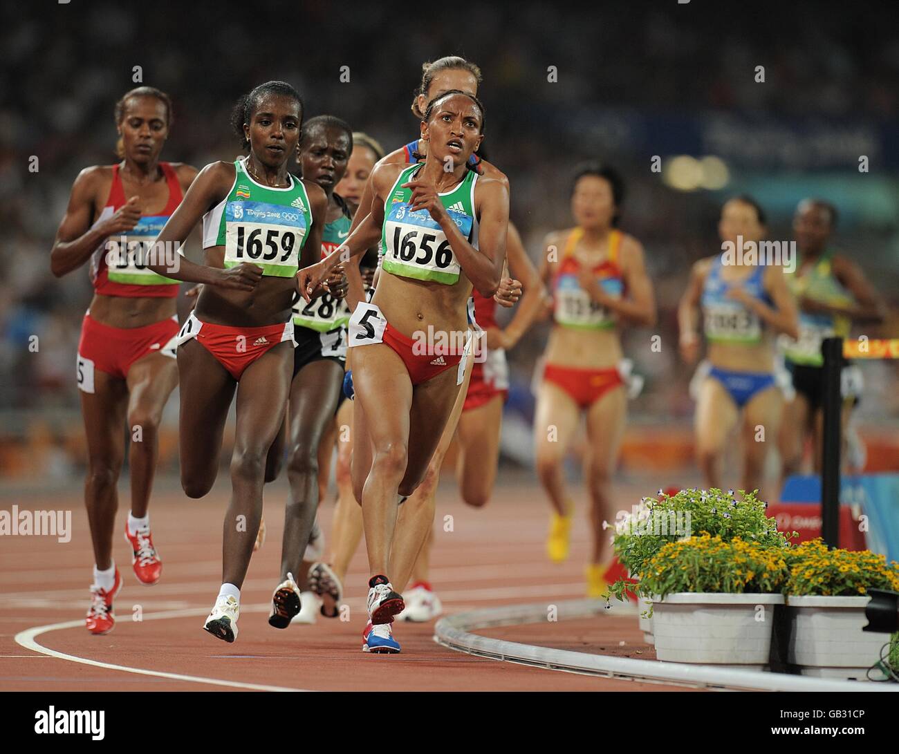 Action from the womens 5000 metres hi-res stock photography and images ...