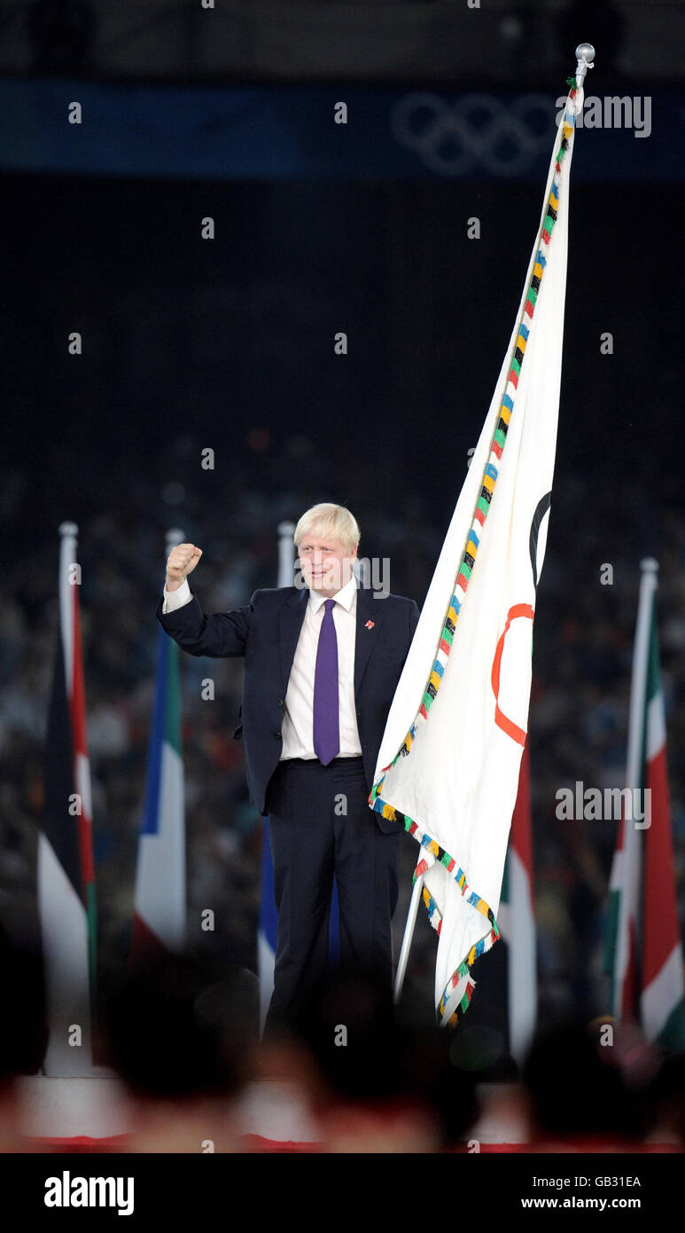 Mayor of London Boris Johnson clenches his fist after waving the ...