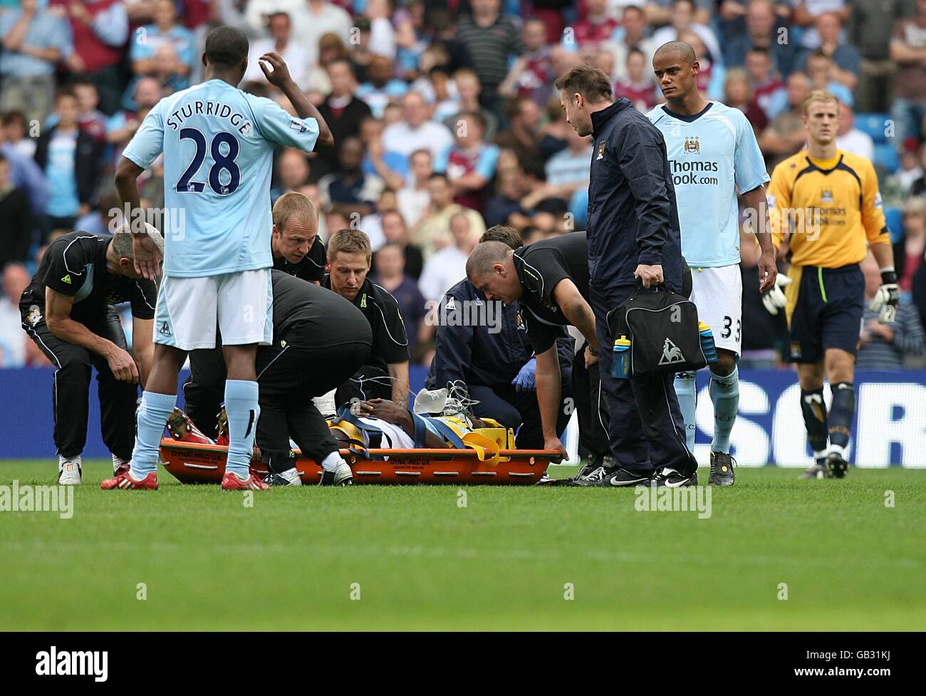 Manchester City's Micah Richards is placed on a stretcher after ...
