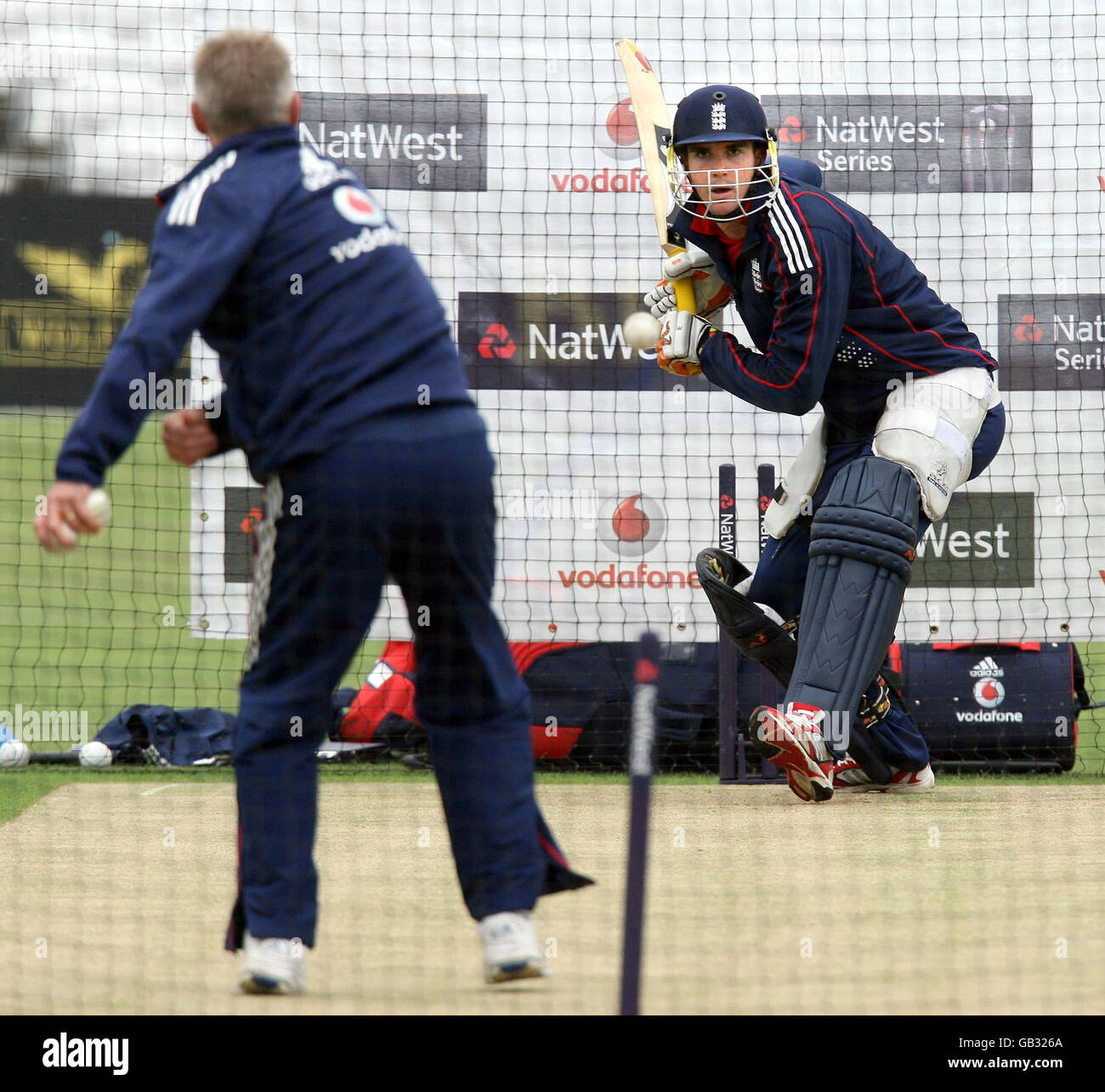 England's Kevin Pietersen with coach Peter Moores during a nets ...