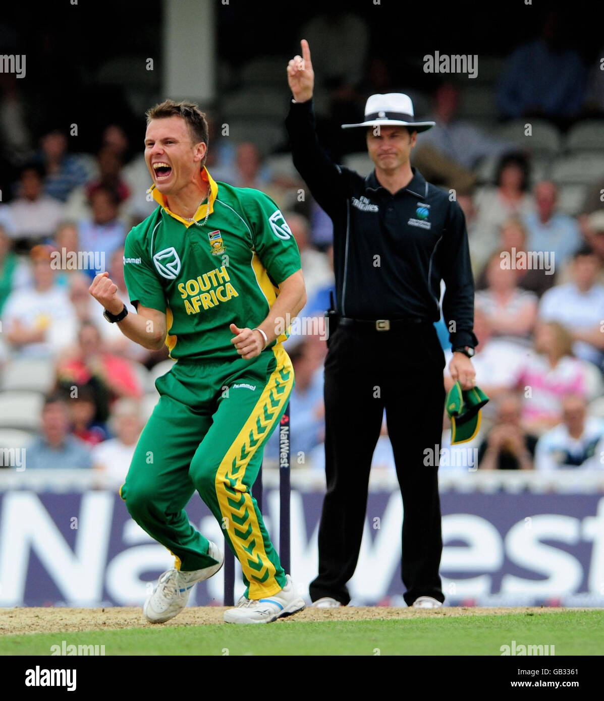 South Africa's Johan Botha celebrates the wicket of England's Ian Bell ...