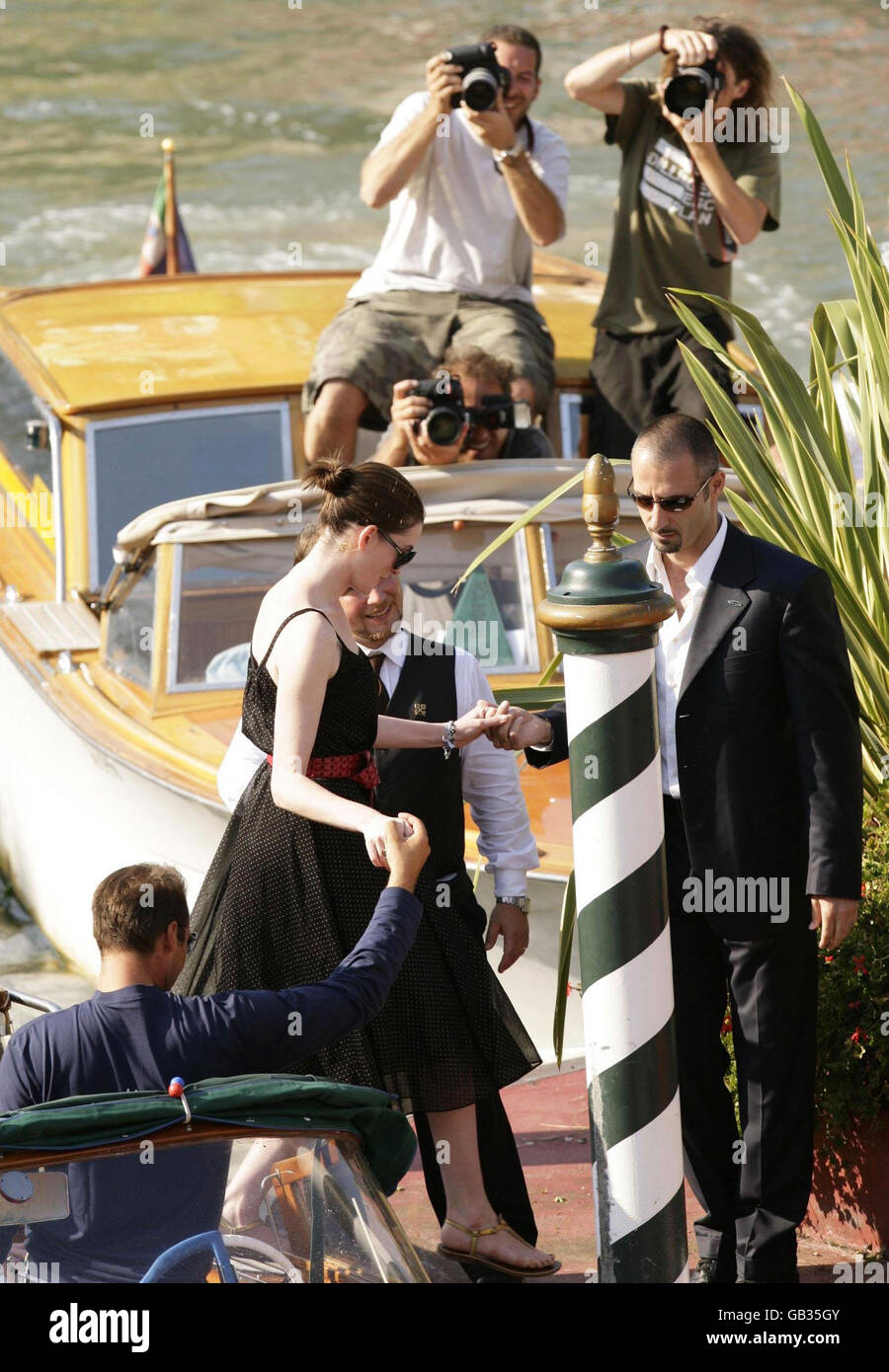 AP OUT. Anne Hathaway arrives by boat at The Excelsior Hotel on Venice ...