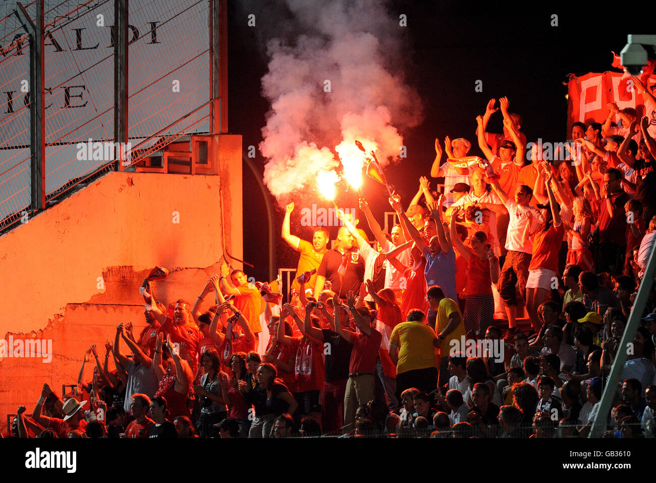 Football supporters red smoke flare flar hi-res stock photography and ...