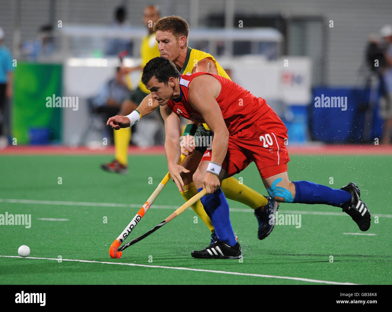 Great Britain's James Tindall and South Africa's Ian Symons battle for ...