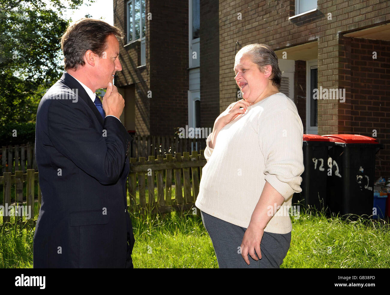Conservative party leader David Cameron speaks with resident Valerie ...