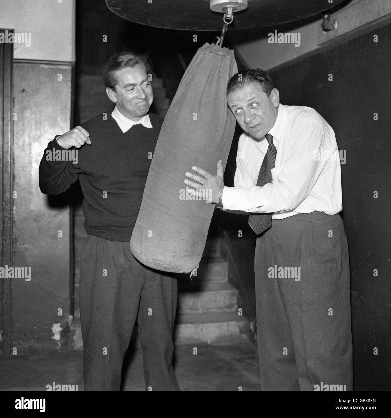 Comedian tony hancock left limbers up with a punchbag hi-res stock ...