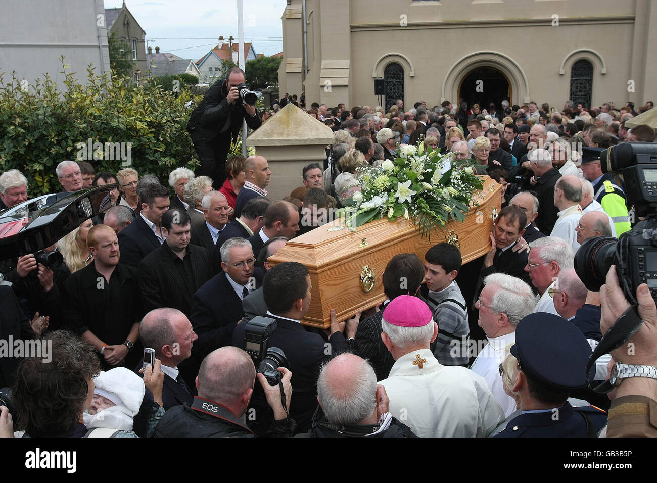 Irish folk singer Ronnie Drew's coffin at the Church of the Holy Rosary ...