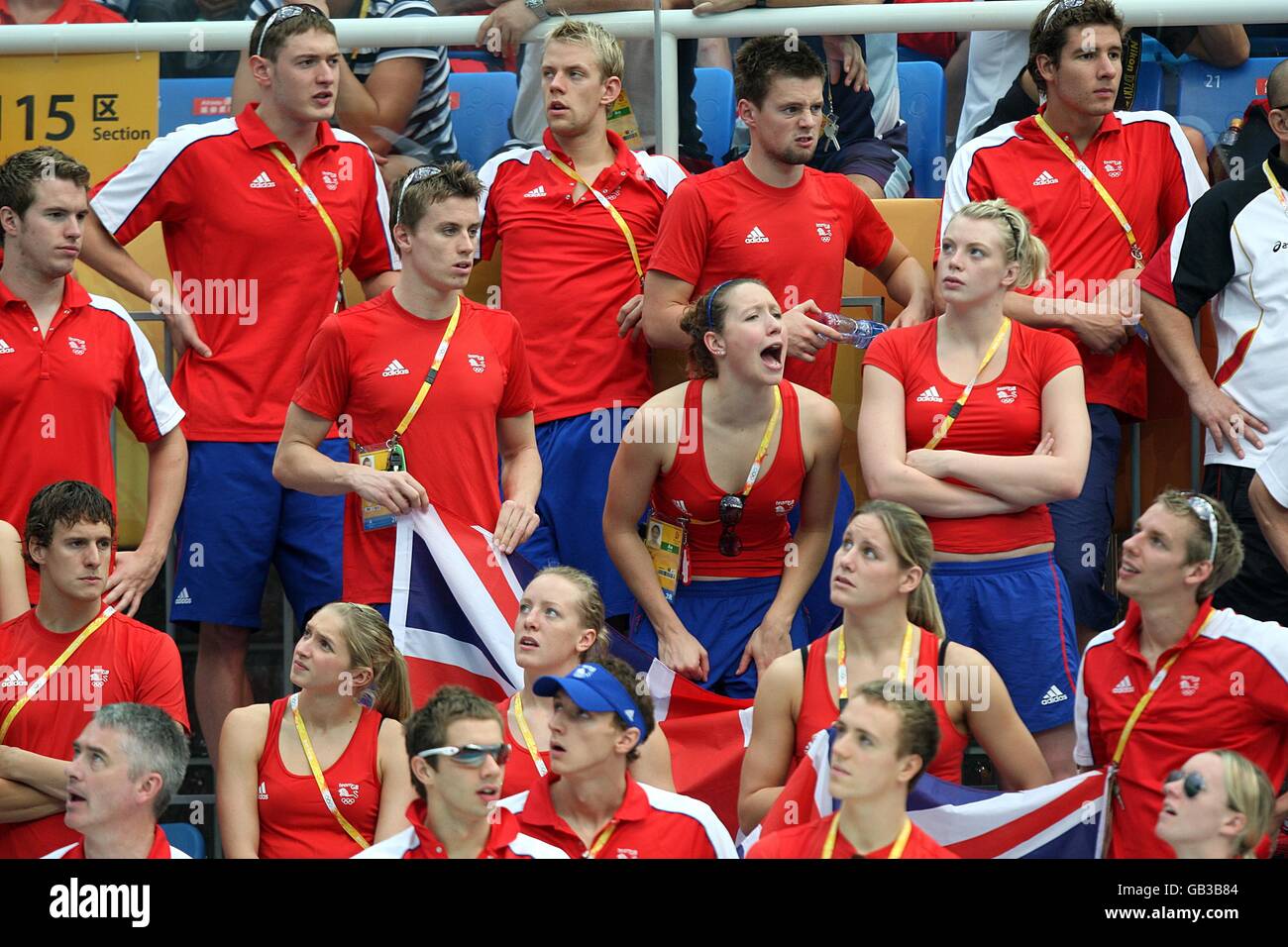 Great Britain's swimming team watch compatriots Elizabeth Simmonds and ...