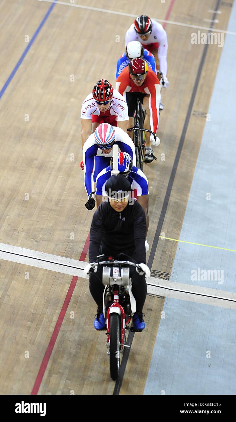 Olympics - Beijing Olympic Games 2008 - Day Eight. The derny leads ...