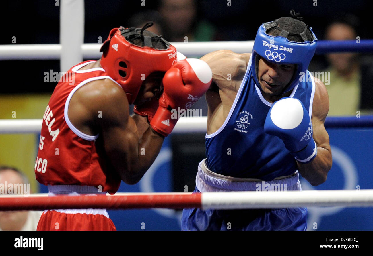 Ireland's Darren John Sutherland (blue) in action against Venezuela's ...