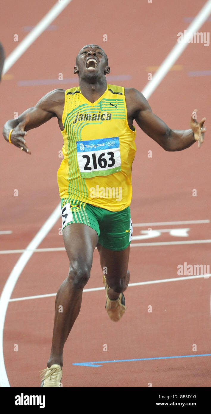 Jamaica's Usain Bolt wins the 200m gold medal in a world record time of ...