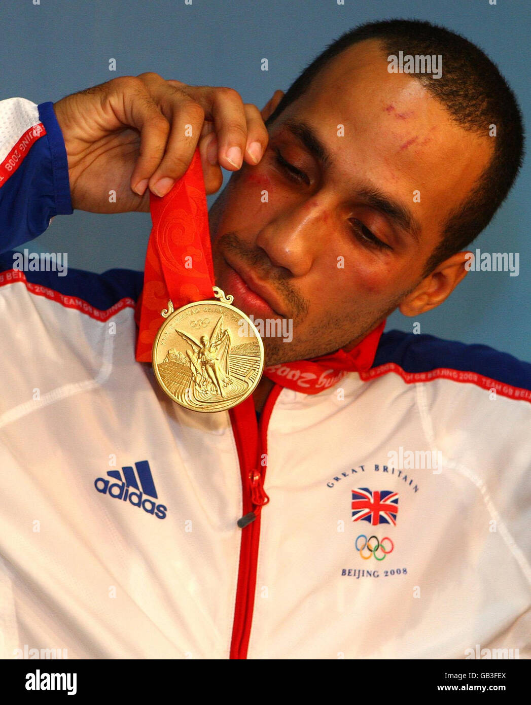 Displaying her olympic gold gold medal hi-res stock photography and ...