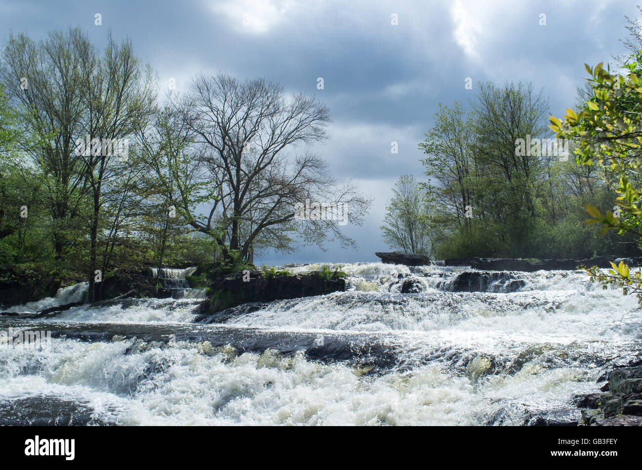 Beautiful springtime waterfall with action frozen in time Stock Photo ...