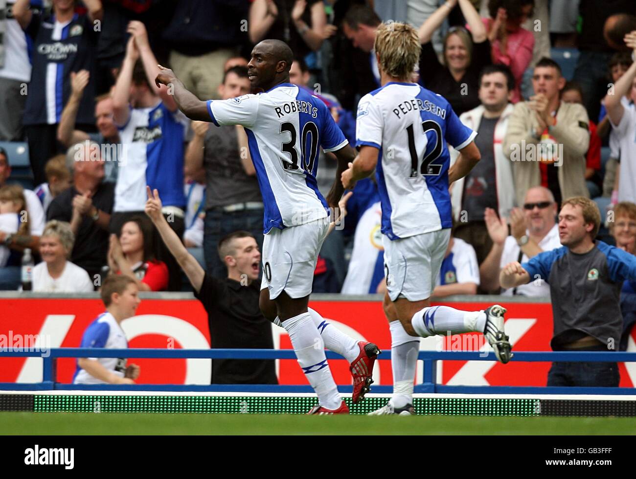 Blackburn Rovers' Jason Roberts (left) celebrates scoring the first ...
