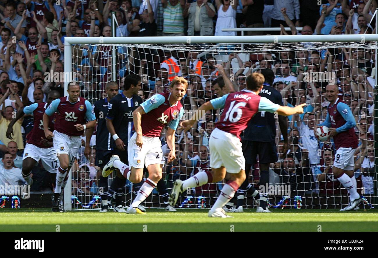 West Ham United's Calum Davenport (centre) turns away to celebrate ...