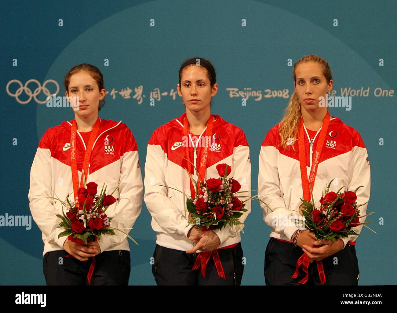 l-r; USA's Mariel Zagunis, Sada Jaconson and Becca Ward after winning ...