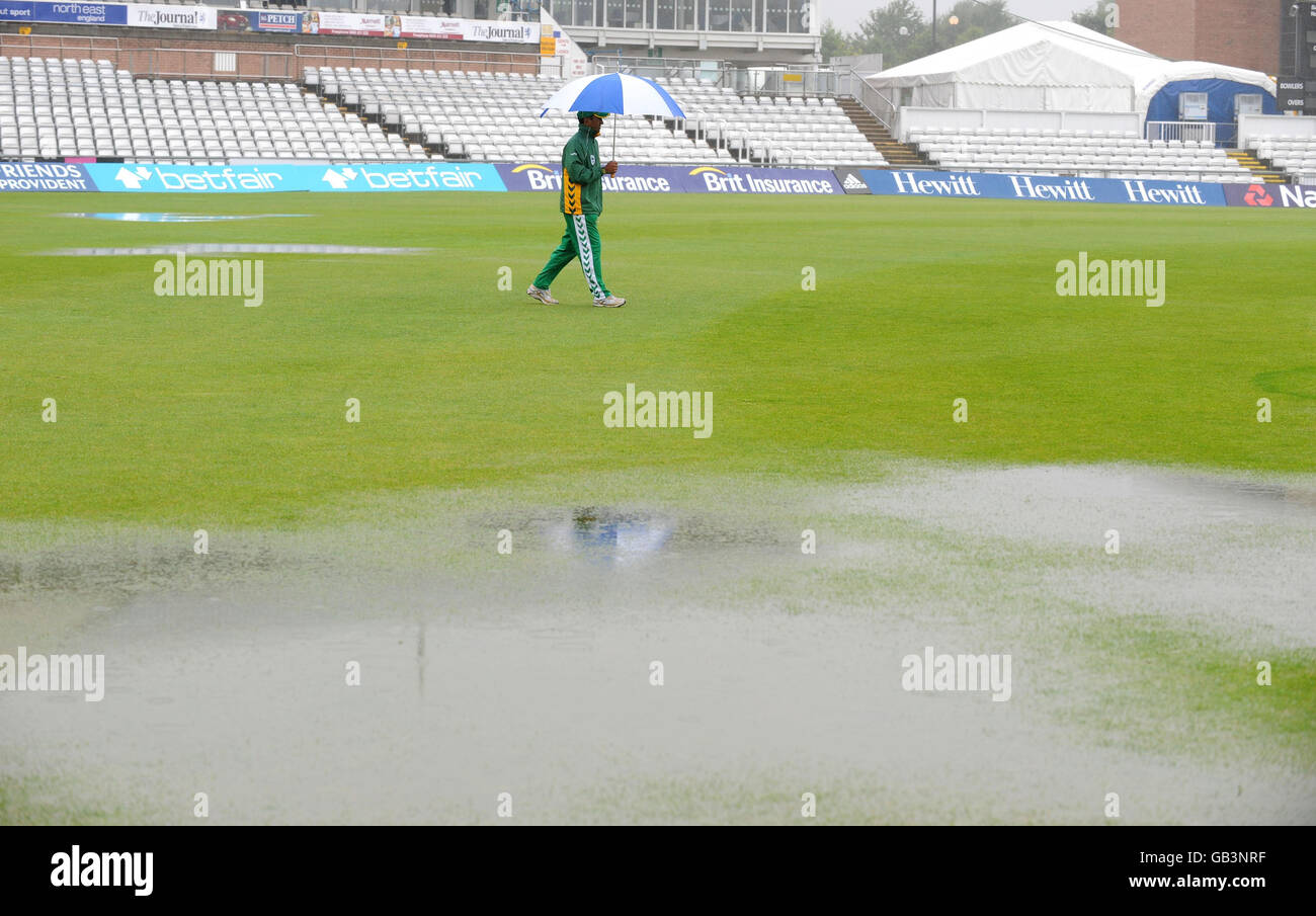 South Africa coach Vincent Barnes takes a look at the waterlogged pitch ...