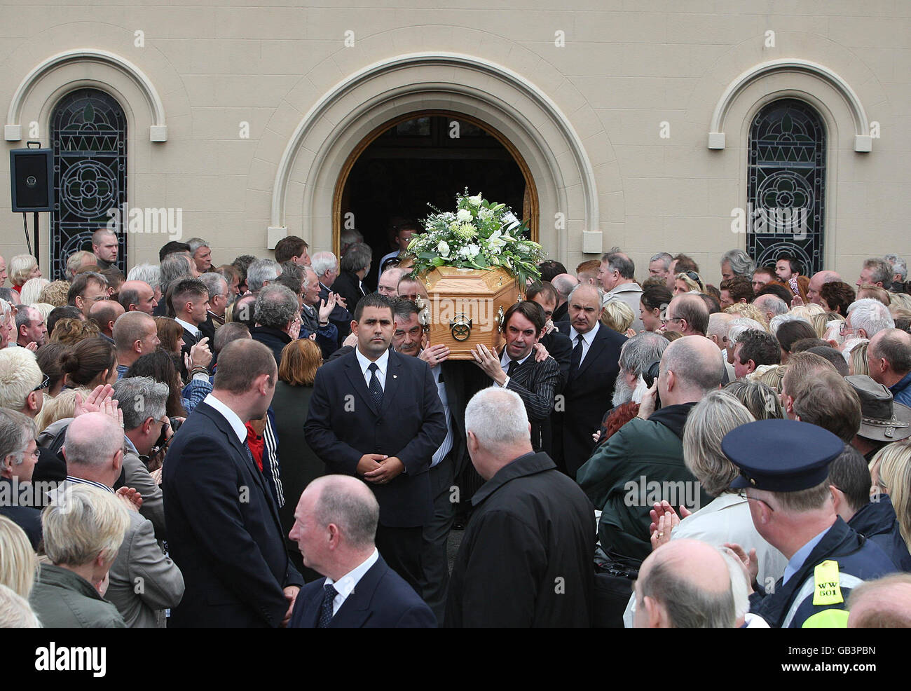 Irish folk singer Ronnie Drew's coffin is removed from the Church of ...