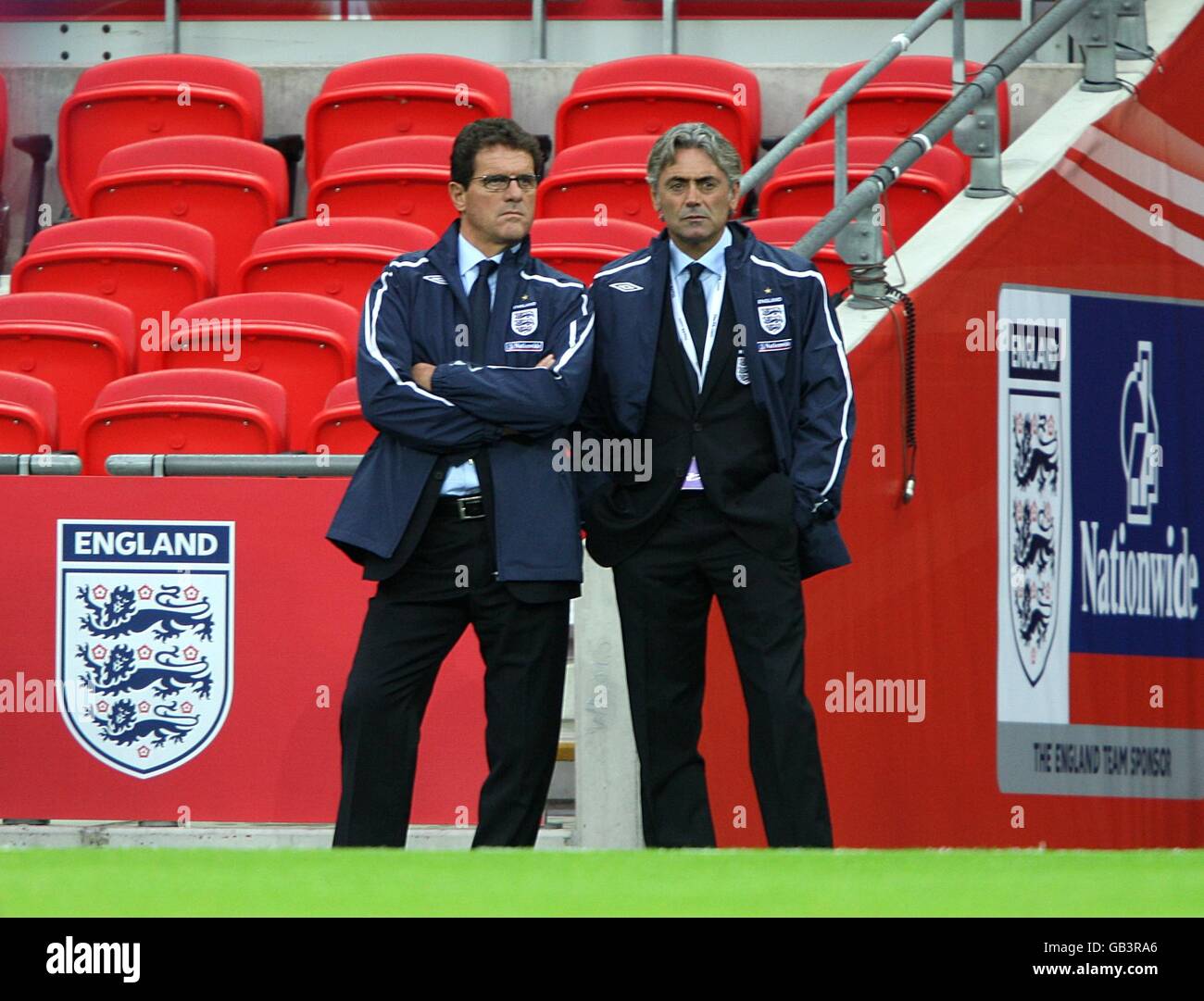 England manager Fabio Capello (left) and General Manager Franco Baldini ...