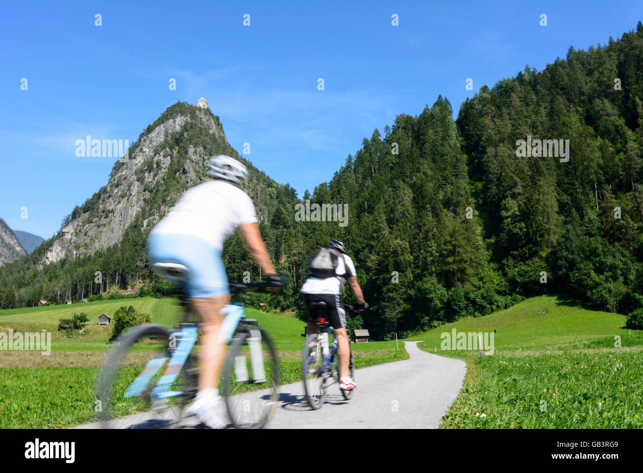 Zams Castle Kronburg and cyclists in the Inn valley Austria Tirol ...