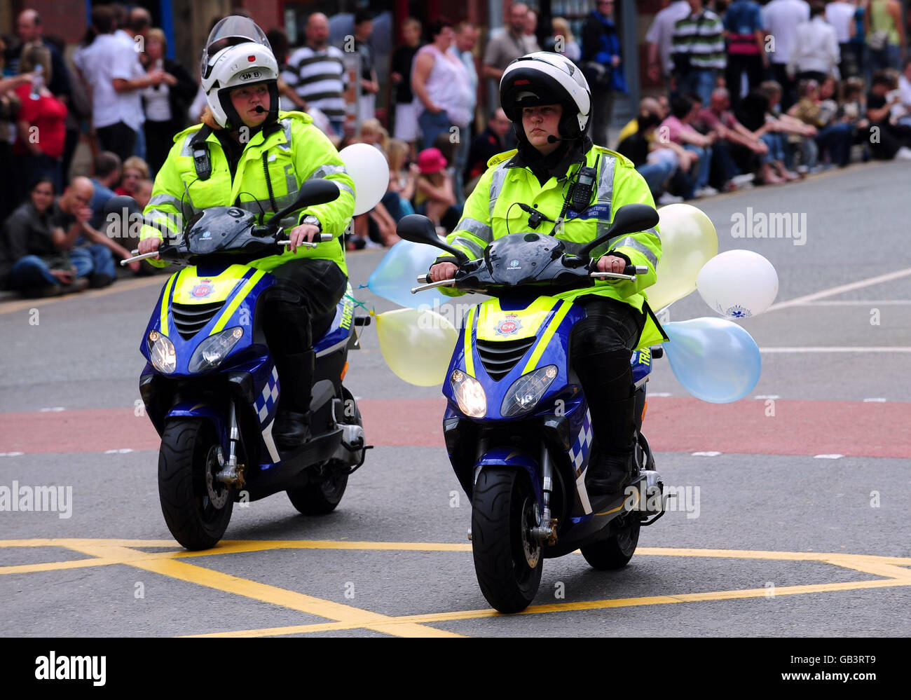 Gay Pride parade Manchester. Police officers ride mopeds along ...