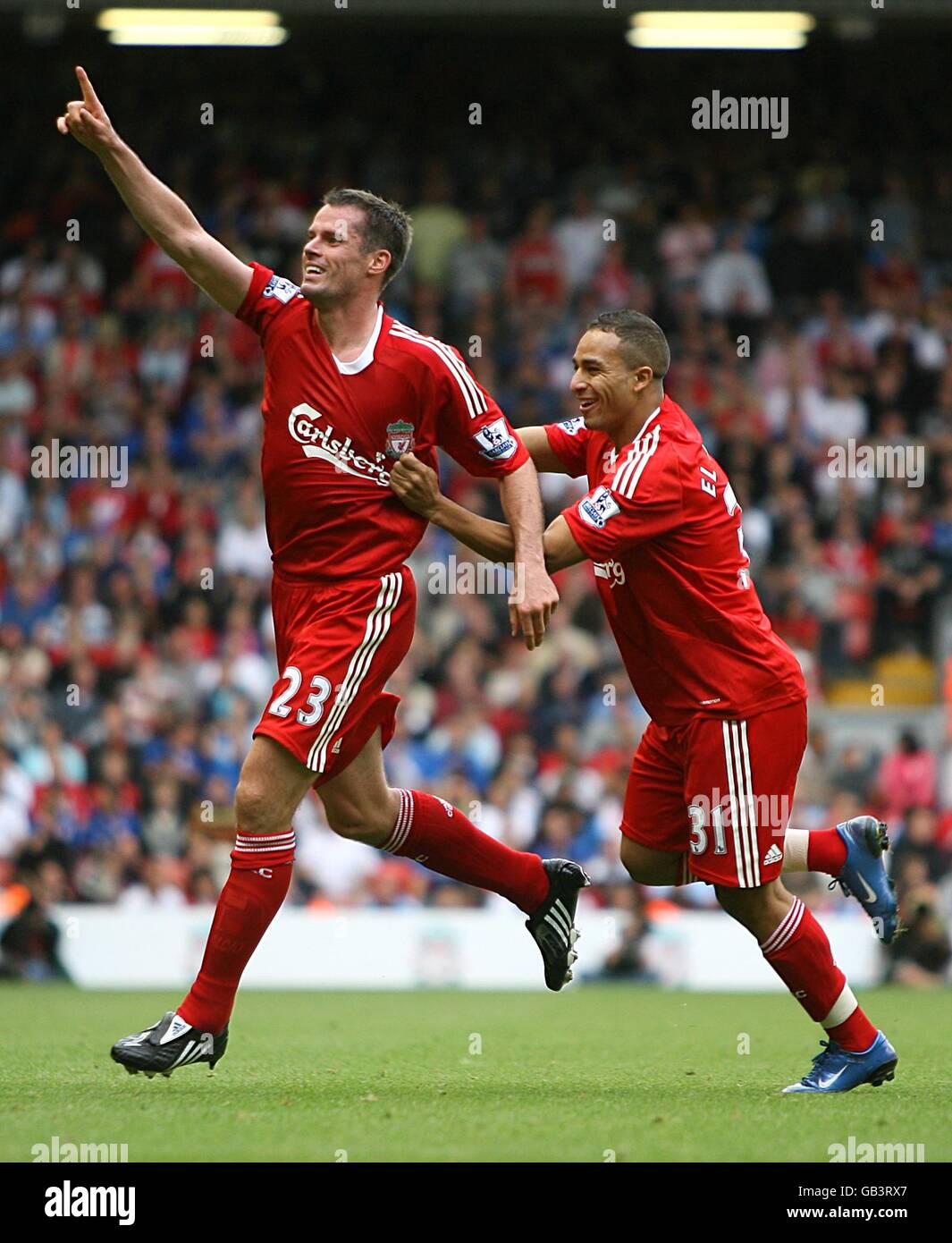 Liverpool's Jamie Carragher celebrates after Middlesbrough's Emanuel ...