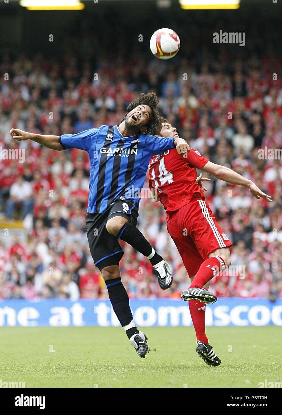 Middlesbrough's Mido and Liverpool's Xabi Alonso in action Stock Photo ...