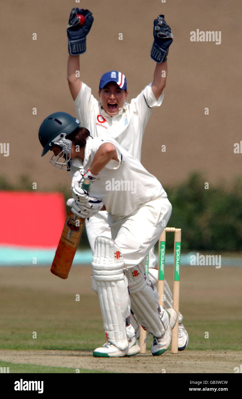 Englands wicketkeeper jane smit celebrates catching south africas ...