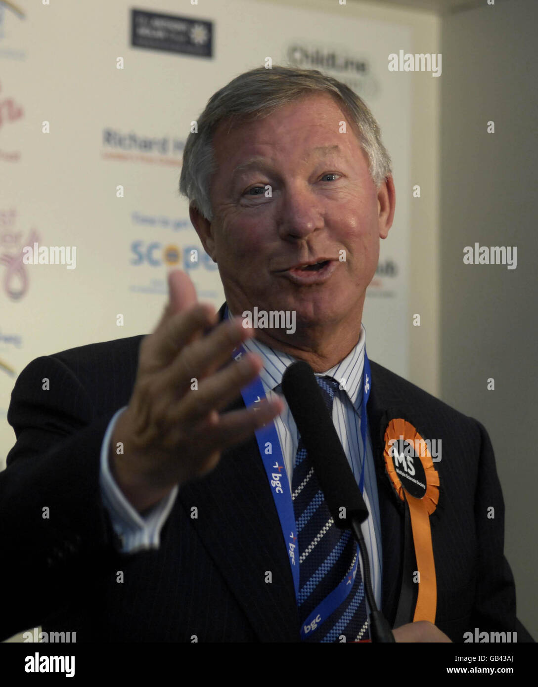 Sir Alex Ferguson speaks during the BGC's fundraising day at Canary ...