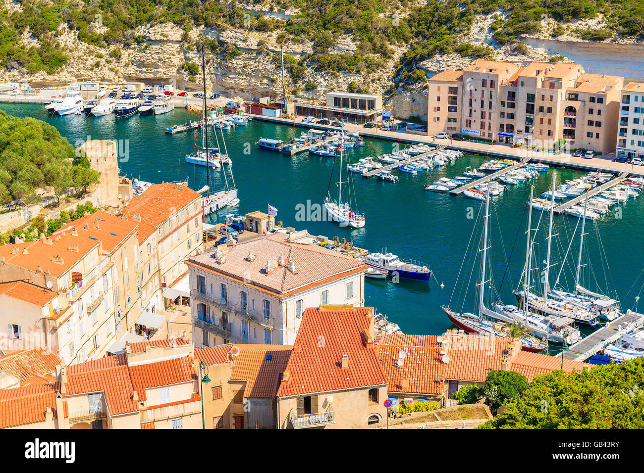 BONIFACIO PORT, CORSICA ISLAND - JUN 23, 2015: A view of Bonifacio port ...