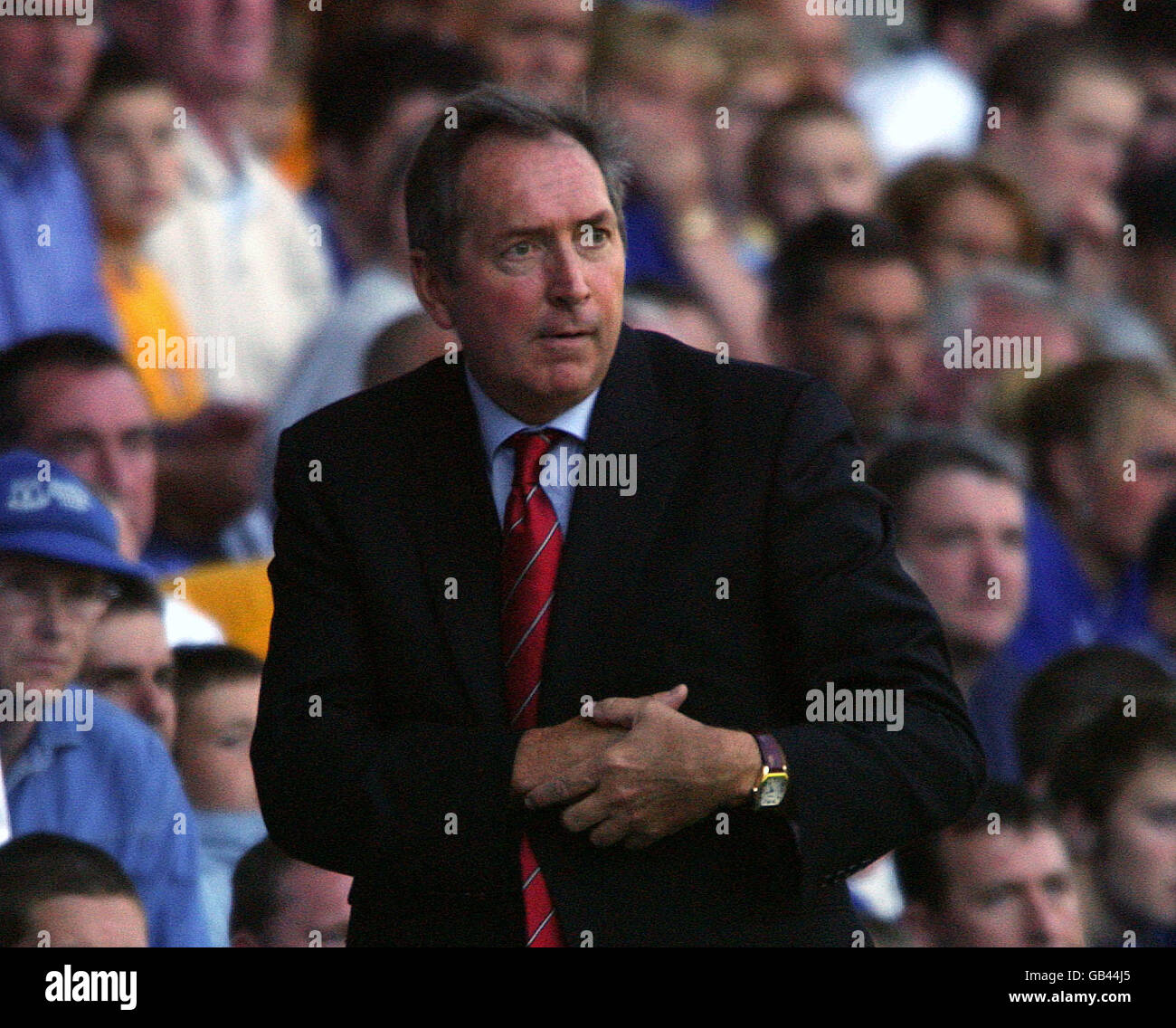 Liverpool Manager Gerard Houllier holds his hands to his heart as they ...