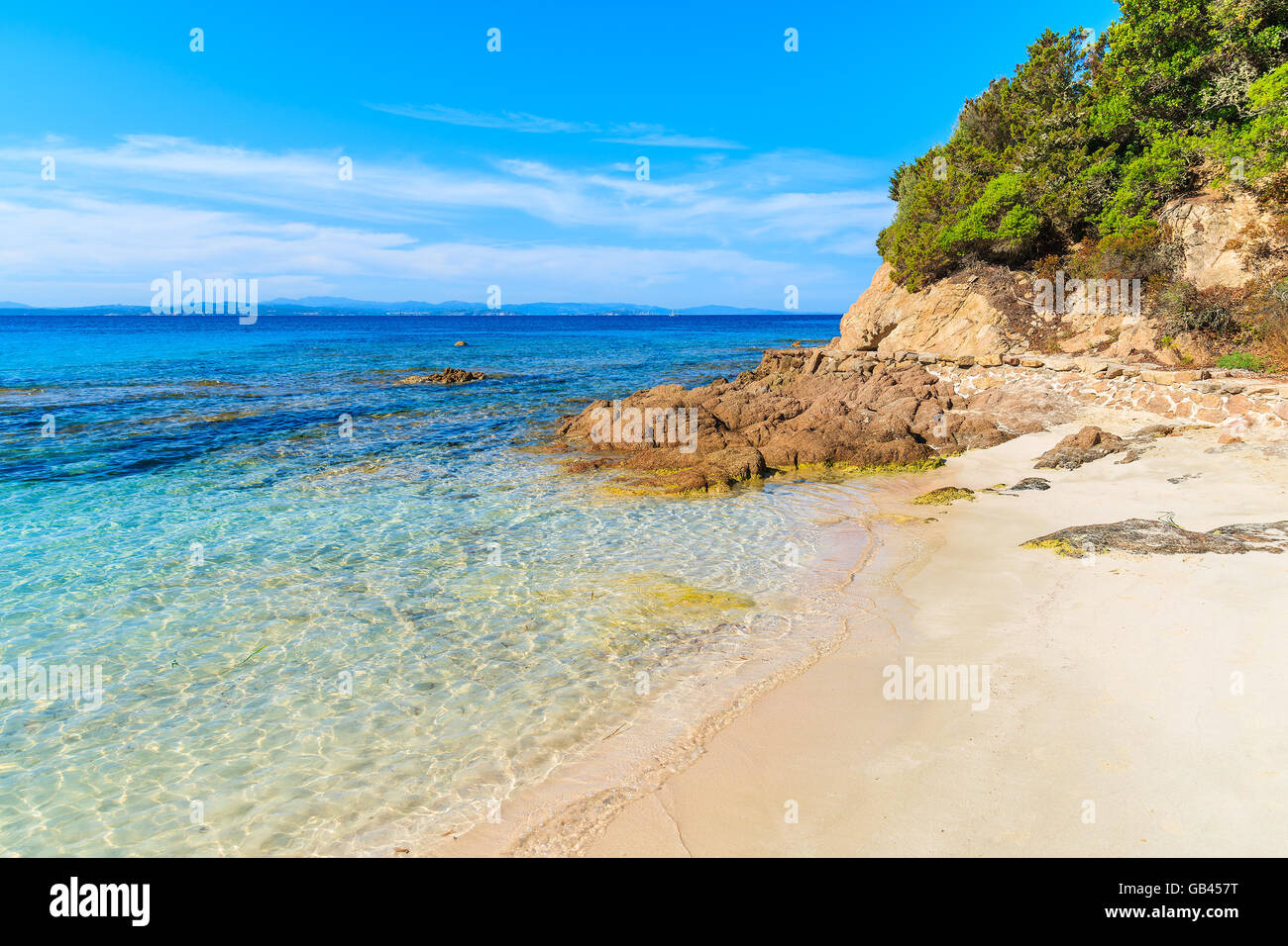 Beautiful sandy Grande Sperone beach with crystal clear azure sea water ...