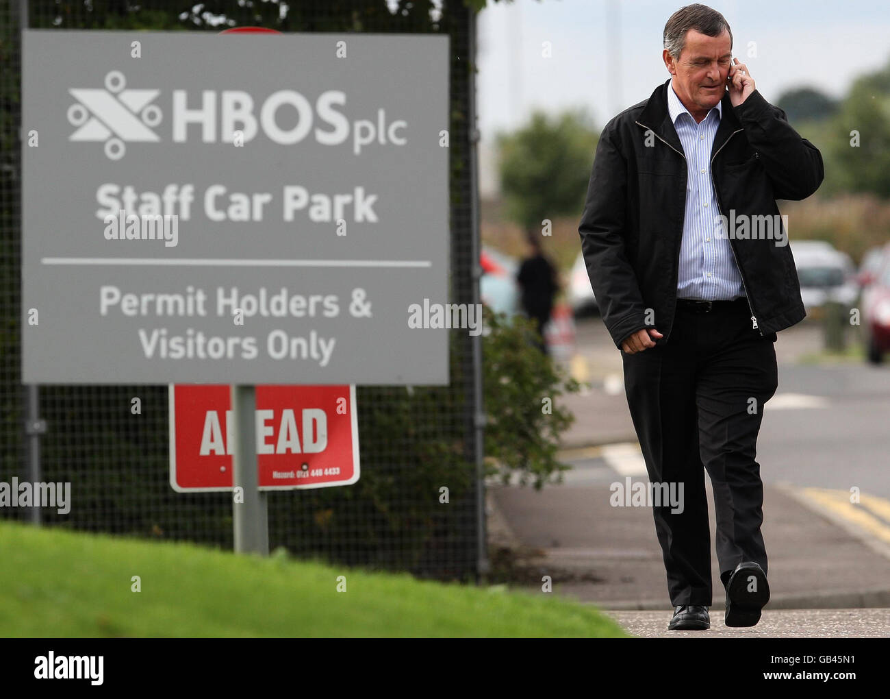Staff leave Tweed House, a Halifax Bank of Scotland building in the ...