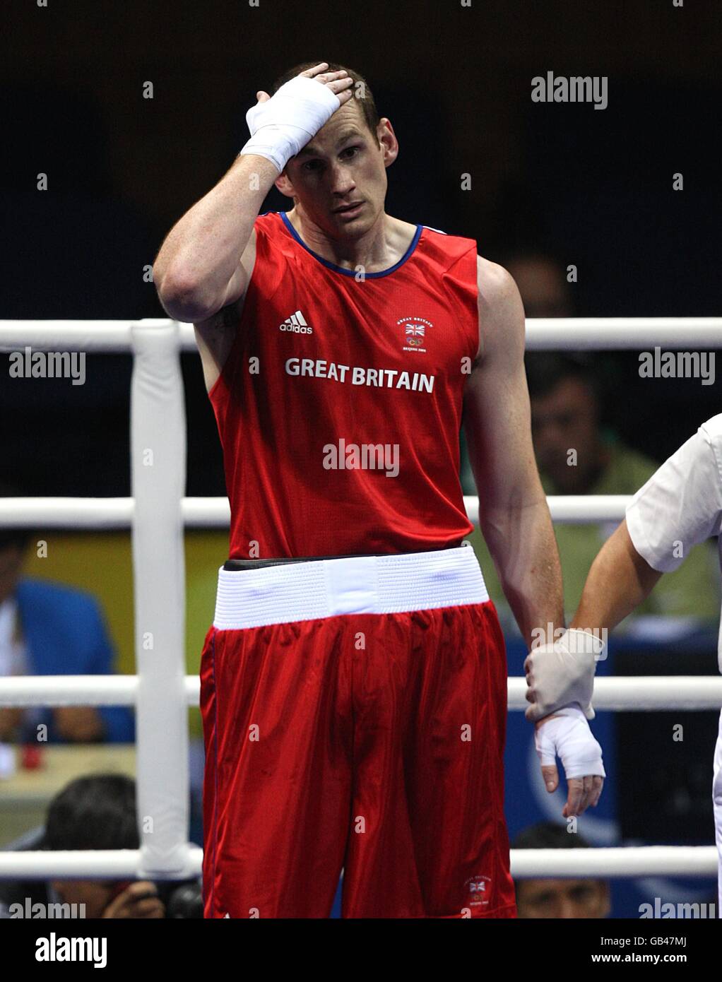 Great Britain's David Price awaits the referee's decison during his ...