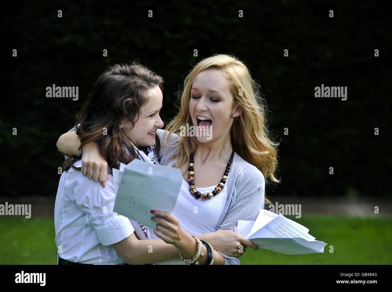Twins, Charis (left) and Darcy Williams from Bristol celebrate getting ...