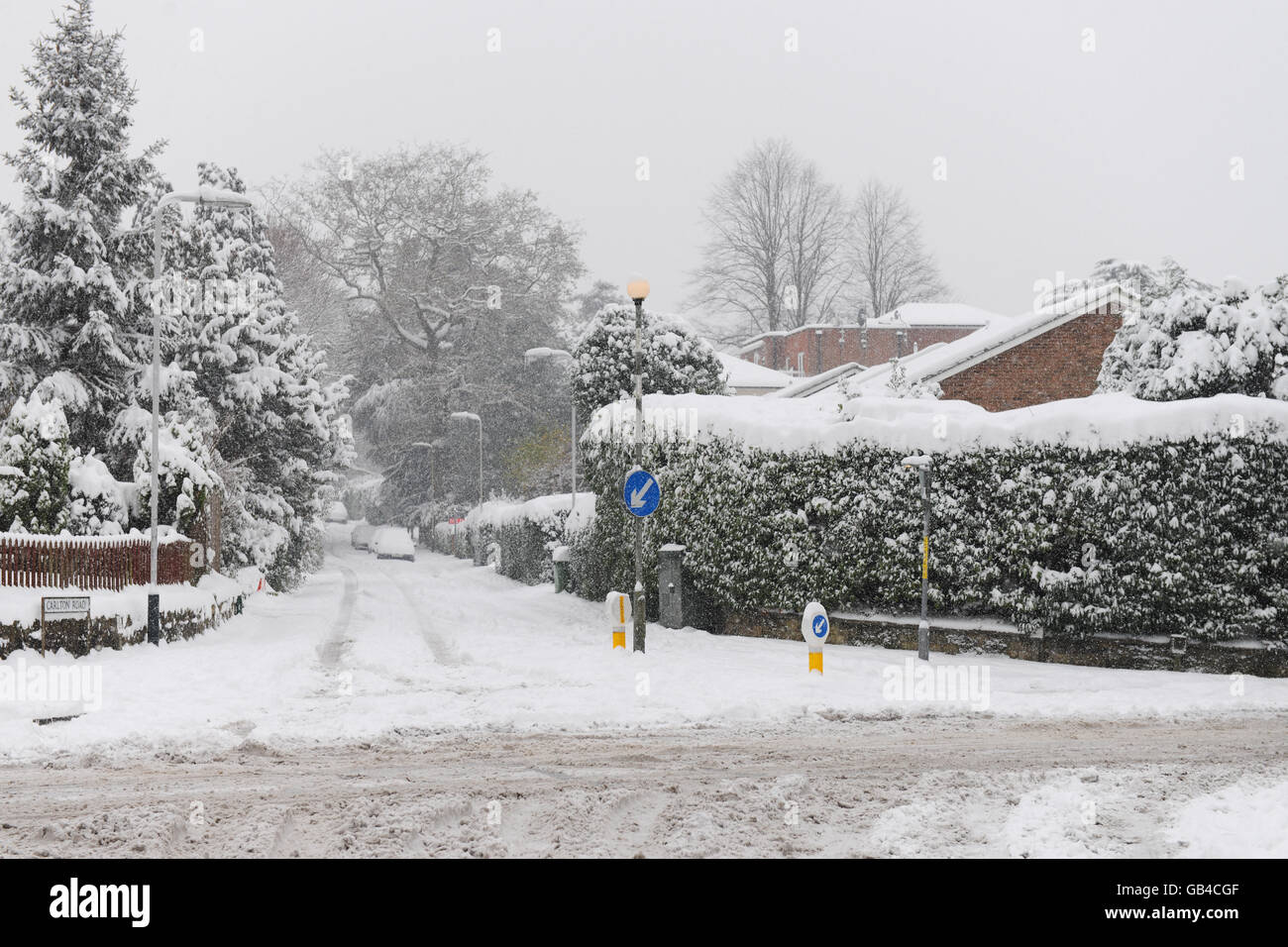 Cars covered in deep snow parked alongside a street in Tunbridge Wells ...