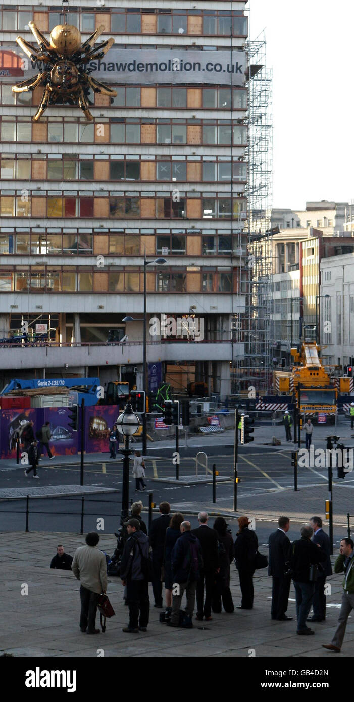 A giant spider hangs from the side of the Concourse Tower in Liverpool ...