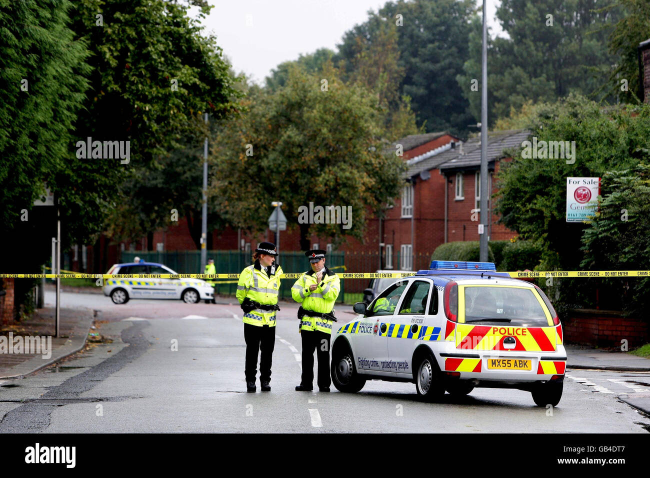 Police officers at the scene on New Lane in Winton, Salford. A murder ...
