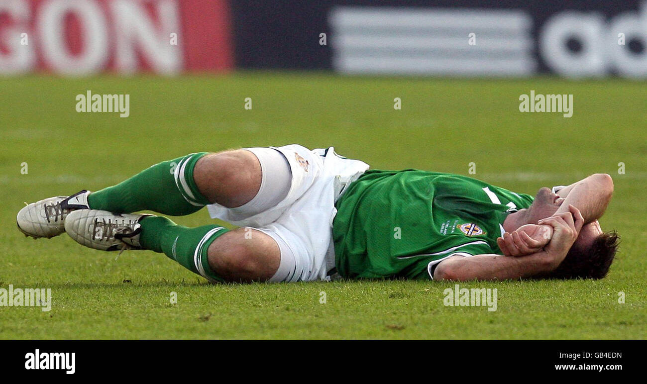 Footballer lying injured hi-res stock photography and images - Alamy