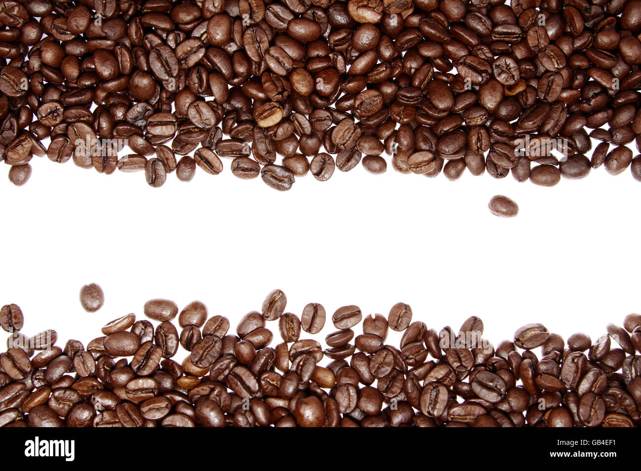Closeup of coffee beans on plain background Stock Photo - Alamy