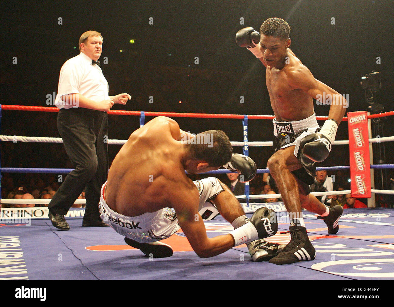 Amir Khan is knocked out by Breidis Prescott during their Commonwealth ...