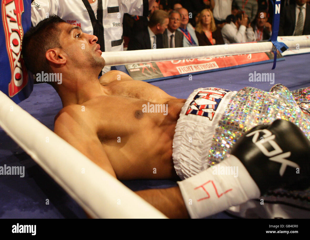 Amir Khan after being knocked out by Breidis Prescott during their ...