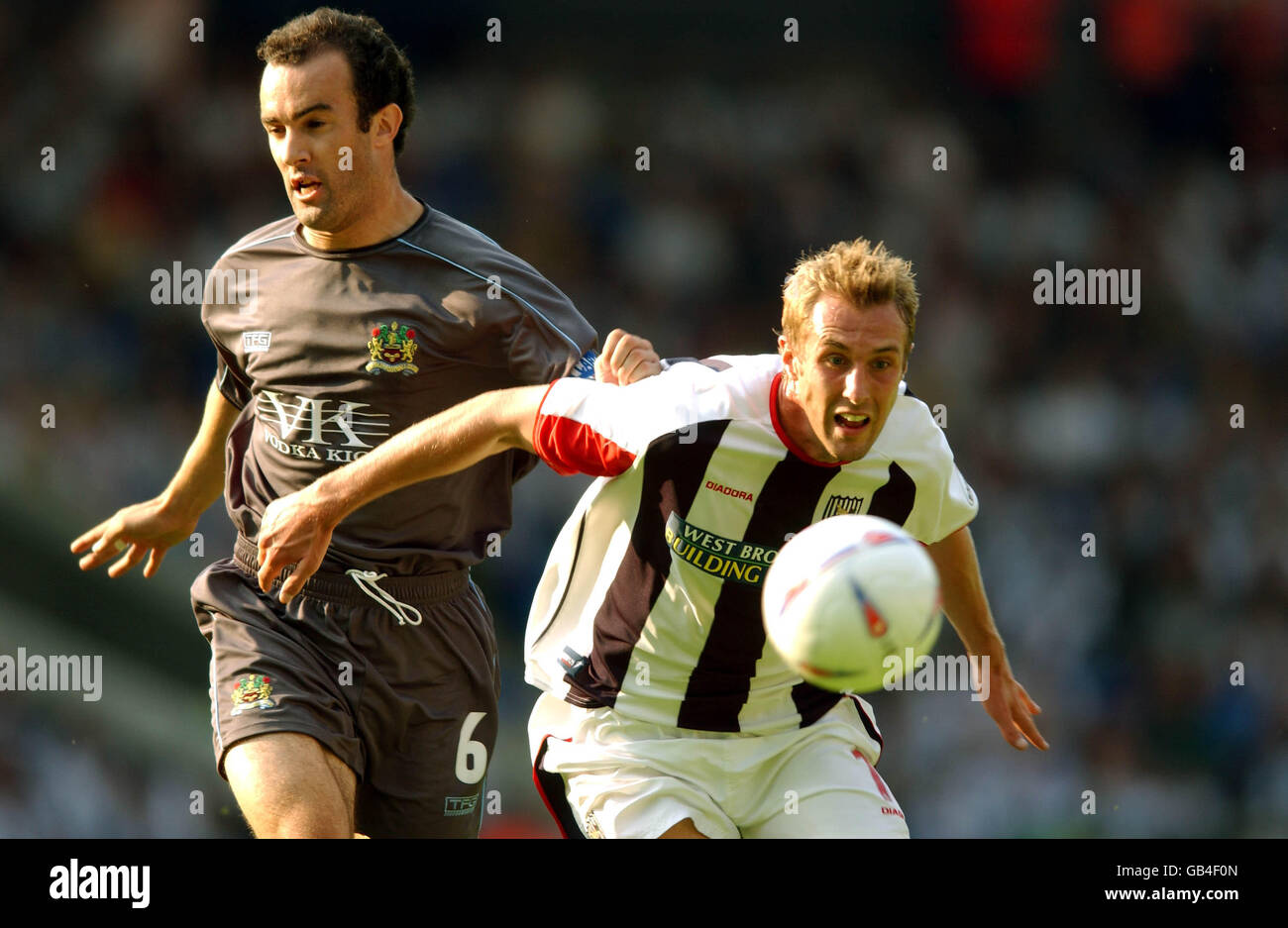 West Bromwich Albion's Rob Hulse and Burnley's Graham Branch battle for ...