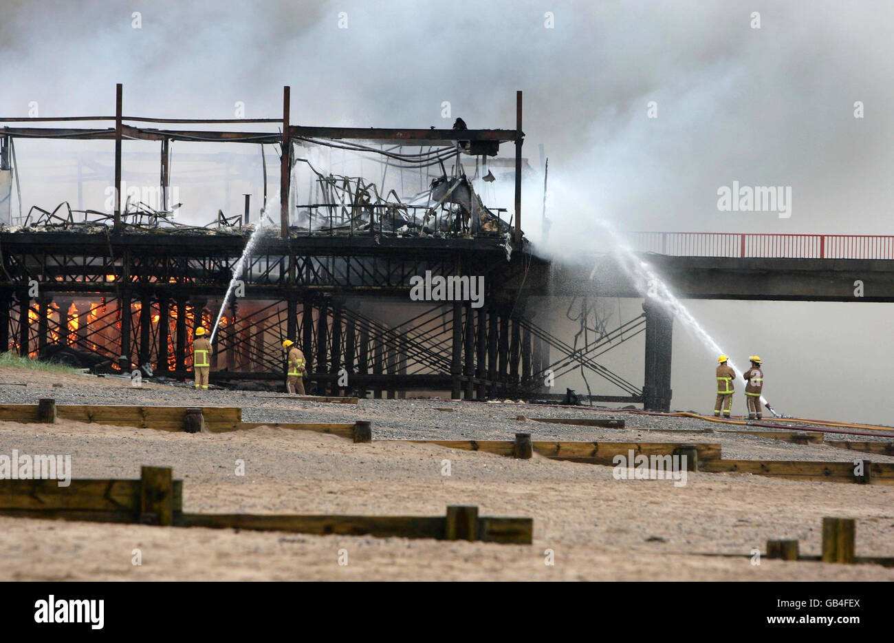 Firefighters tackle the fire on Fleetwood pier after the blaze ...