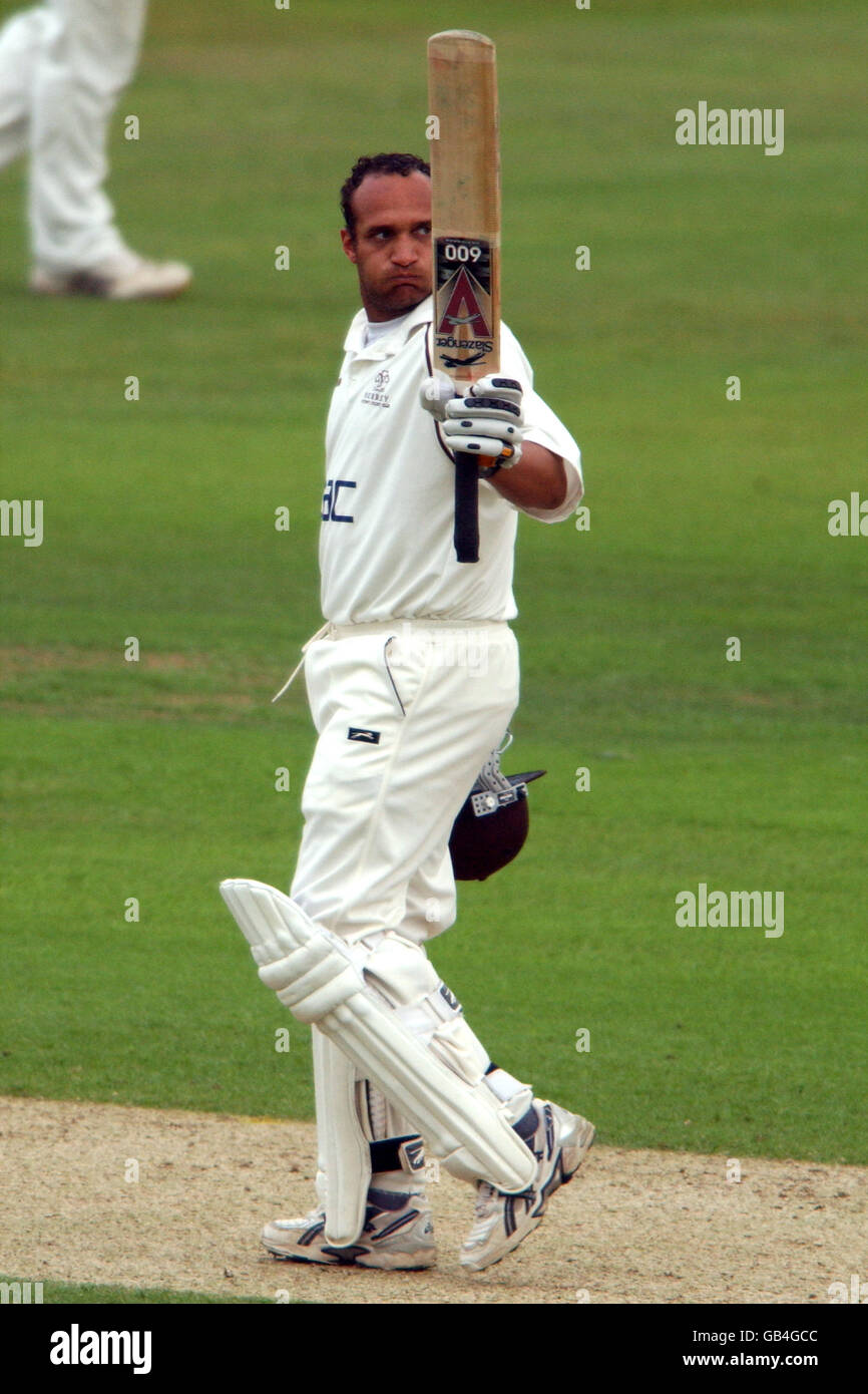 Surrey's Mark Butcher celebrates scoring his 25th first class 100 Stock ...