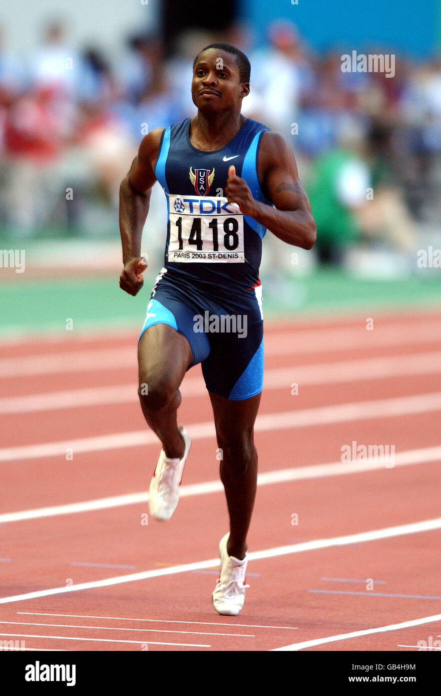 Usas tim montgomery in action hi-res stock photography and images - Alamy