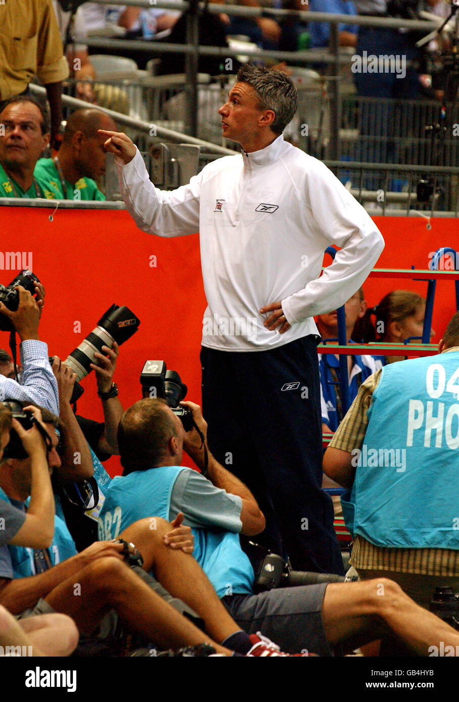 Great Britain's Jonathan Edwards finds himself the centre of attention ...