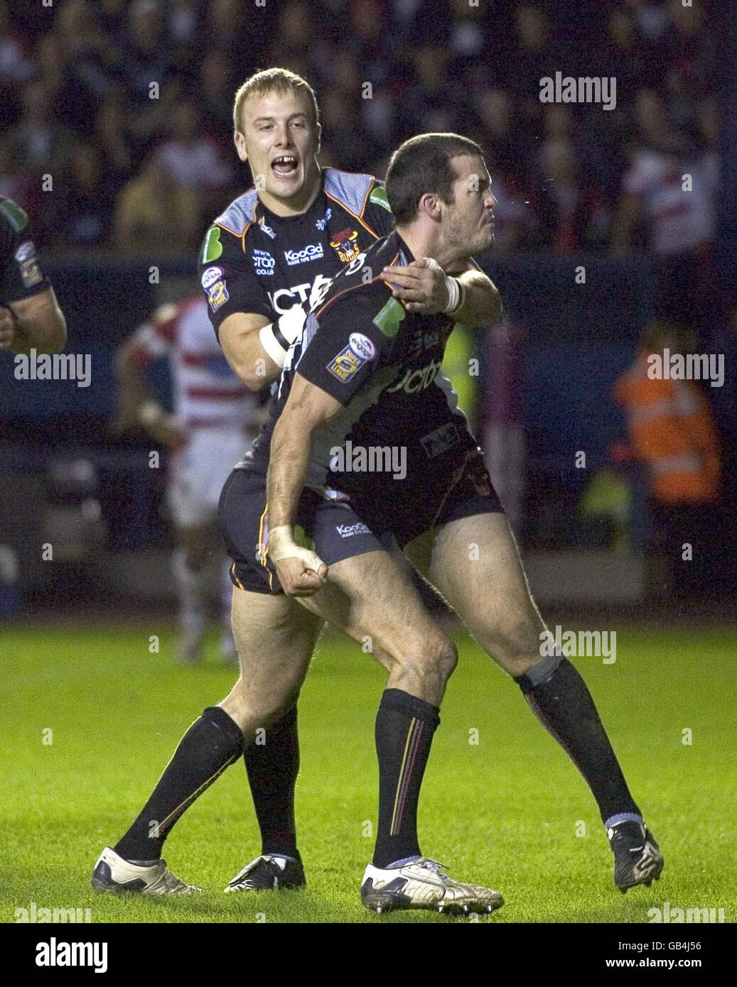 Bradford's Simon Finnigan celebrates his second half try with team mate ...