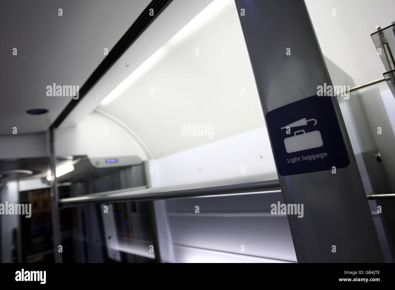 A generic photograph of the luggage rack on a first class coach on the ...
