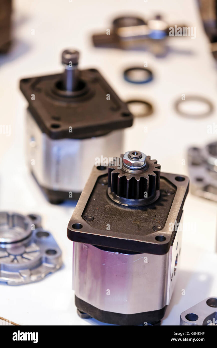 Closeup new design of parts for machine on exhibition show; note ...